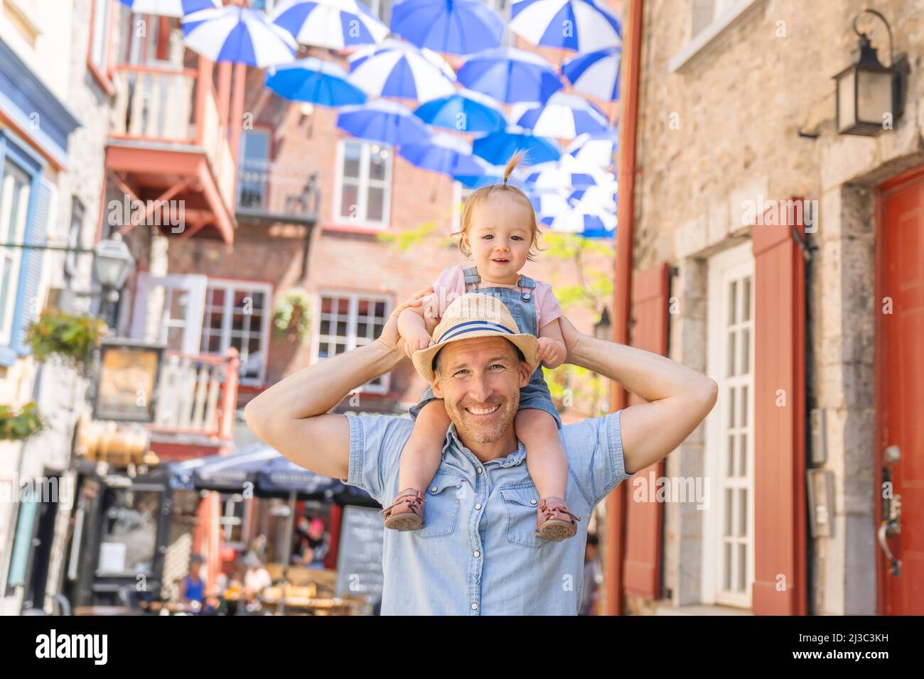 Young father on street with tiny daughter girl Stock Photo - Alamy