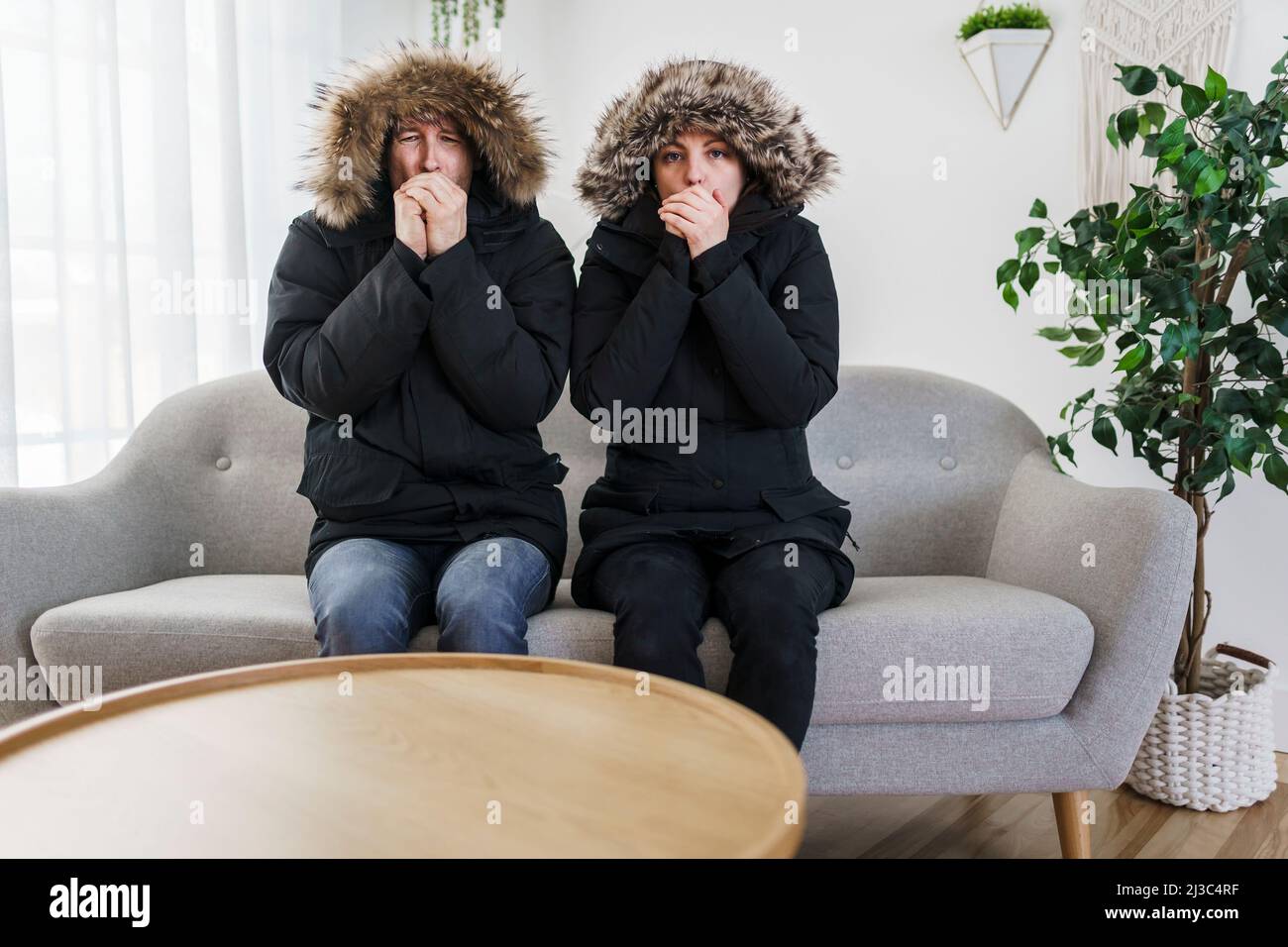 Cold family inside house hi-res stock photography and images - Alamy