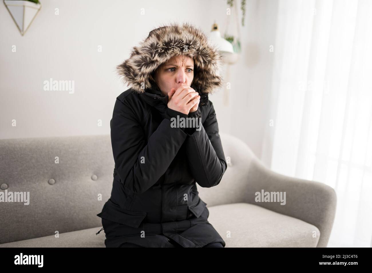Woman cold house hi-res stock photography and images - Alamy