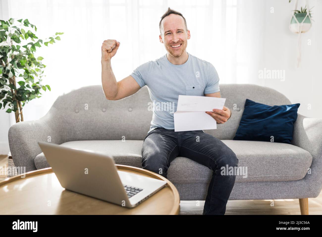 Man using laptop analyzing documents hi-res stock photography and ...