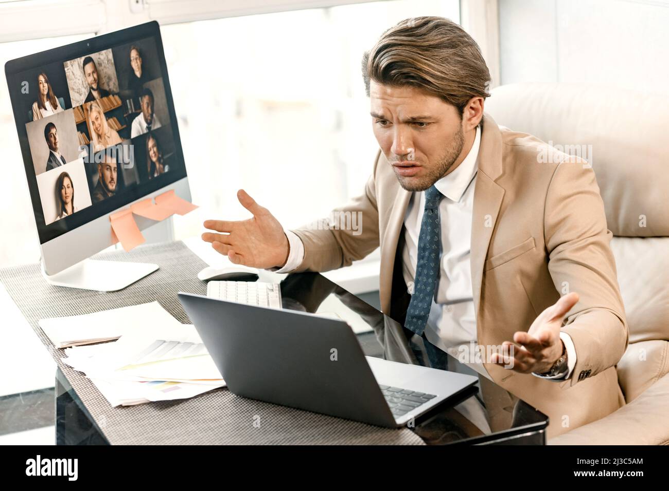 Stylish businessman holding morning online meeting on laptop, PC in ...
