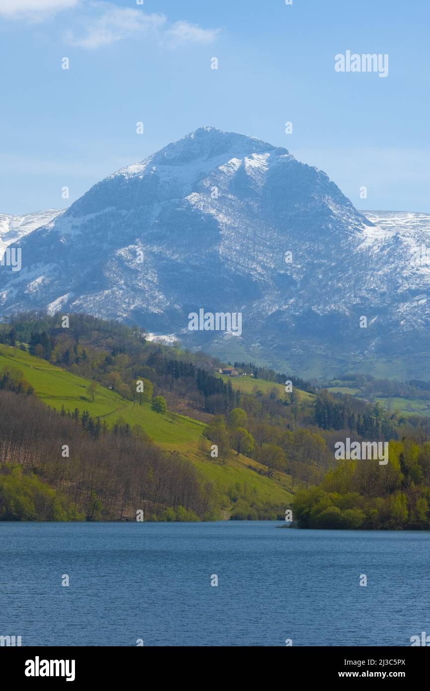 Ibiur reservoir and Mount Txindoki in the Sierra de Aralar Natural Park ...