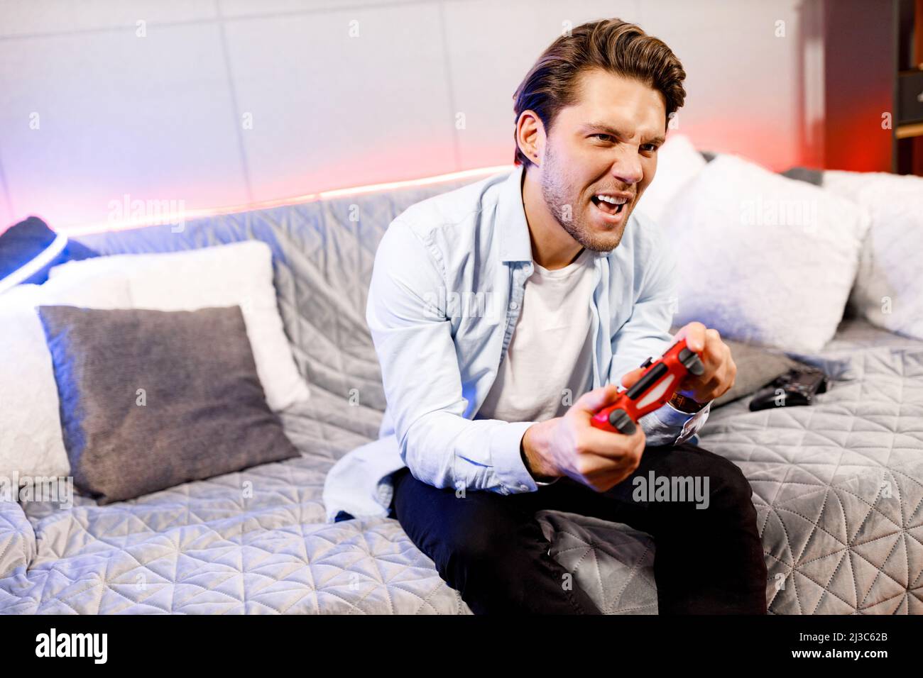 Male playstation controller hi-res stock photography and images - Alamy