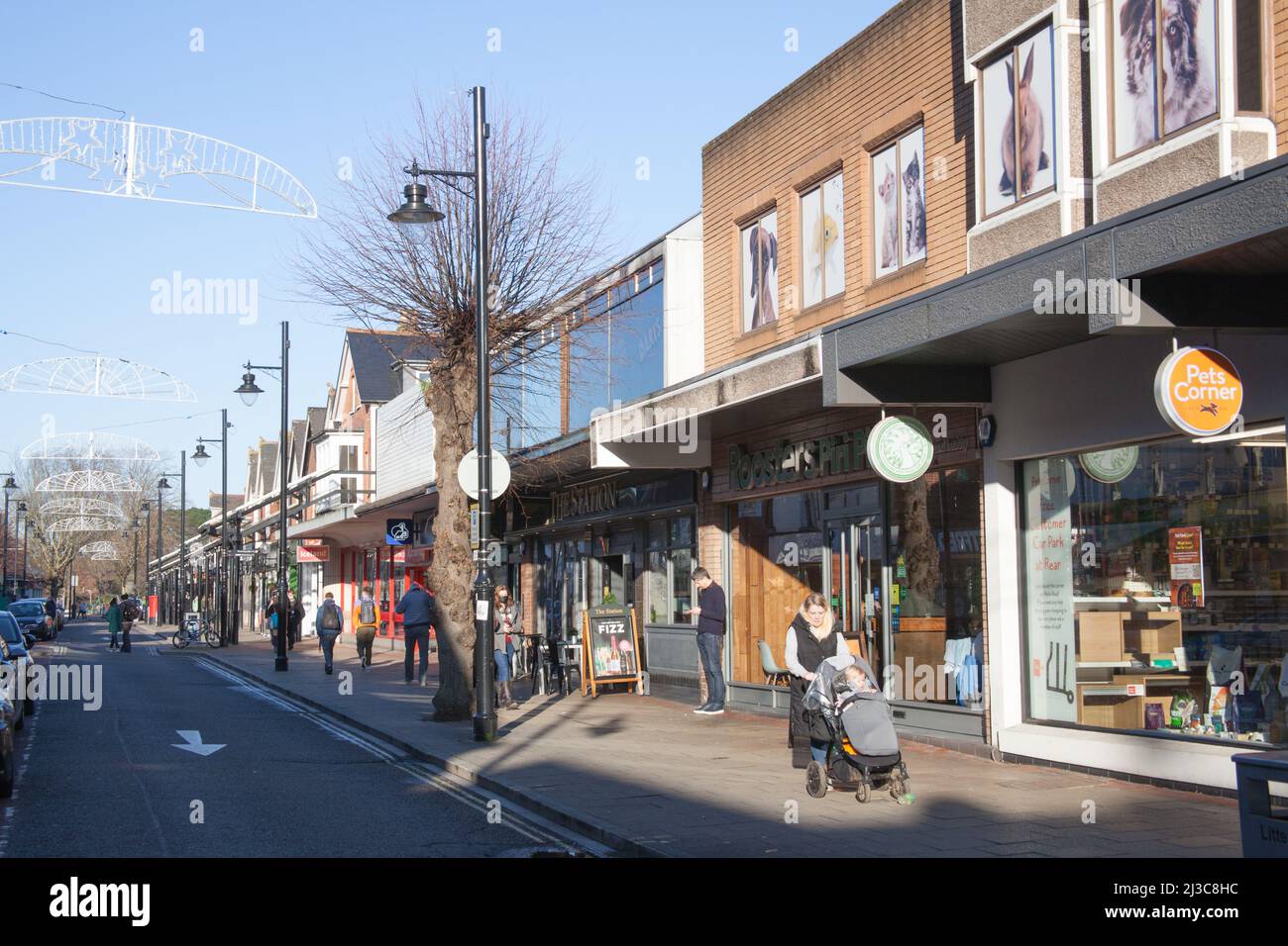 Shoppers walk down the High Street in Eastleigh in Hampshire in the UK ...