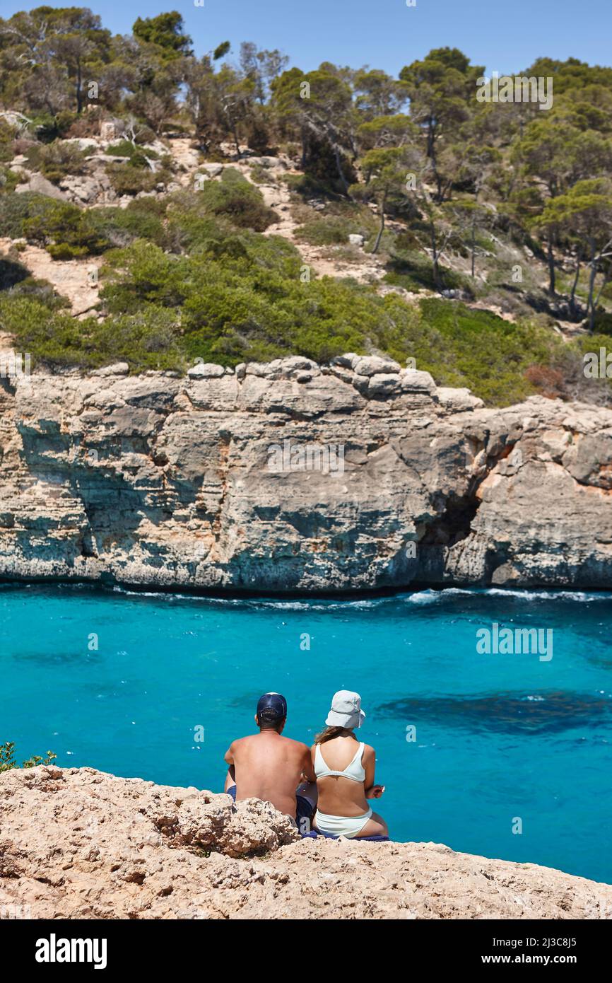 Summer in Spain. Couple enjoying mediterranean turquoise water in ...