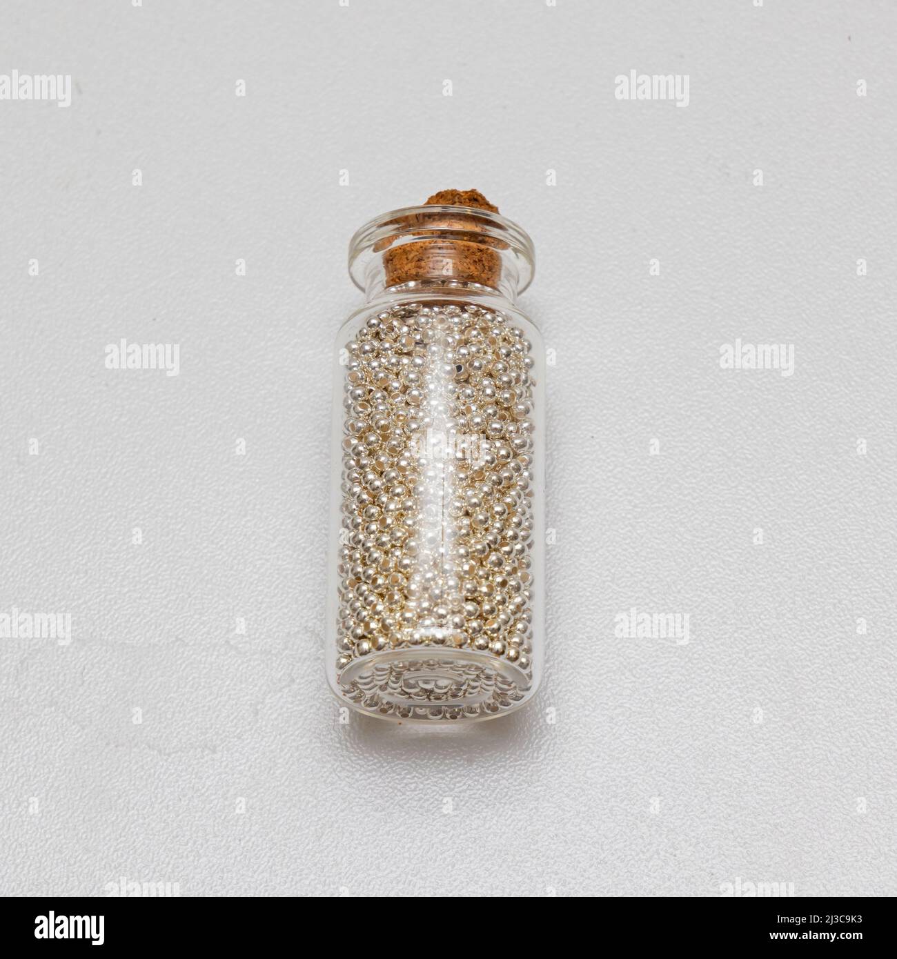 Full Bottle of Small Silver Pearls Jewellery Craft Material Stock Photo ...