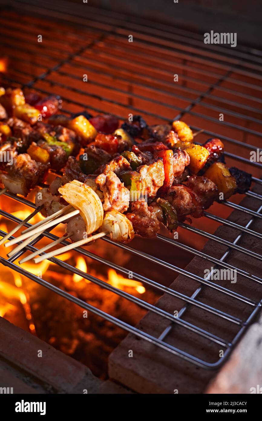 barbecue grill with smoke and flames in the kitchen Stock Photo - Alamy