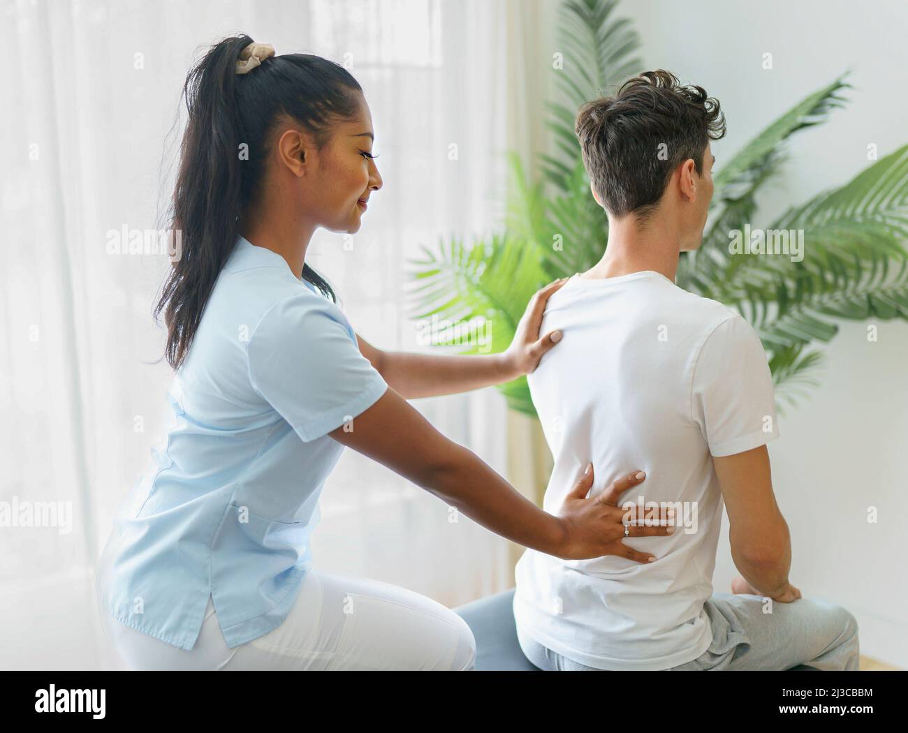 black rehabilitation woman physiotherapy at physio clinic with customer Stock Photo - Alamy