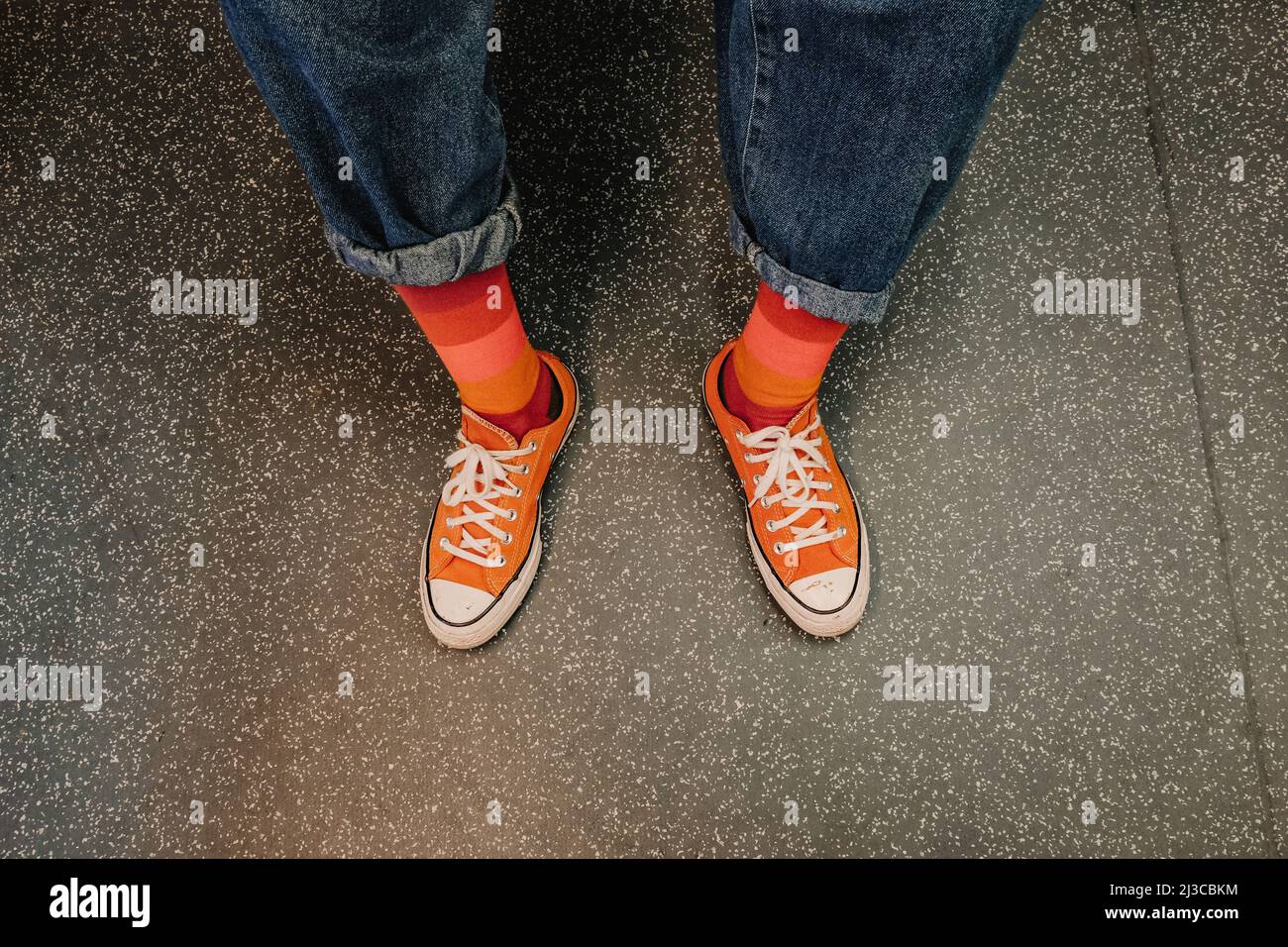 Feet with converse sneakers Stock Photo - Alamy