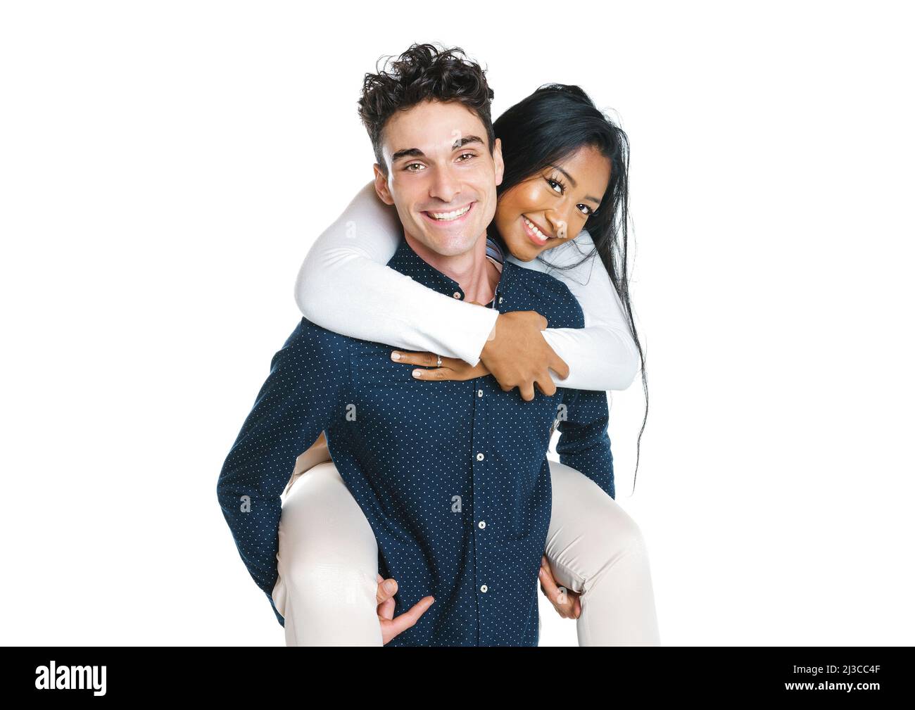 young couple standing together posing in studio white background Stock ...