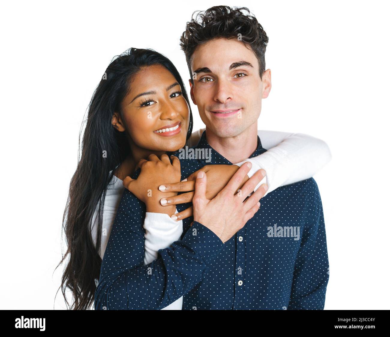 young couple standing together posing in studio white background Stock ...