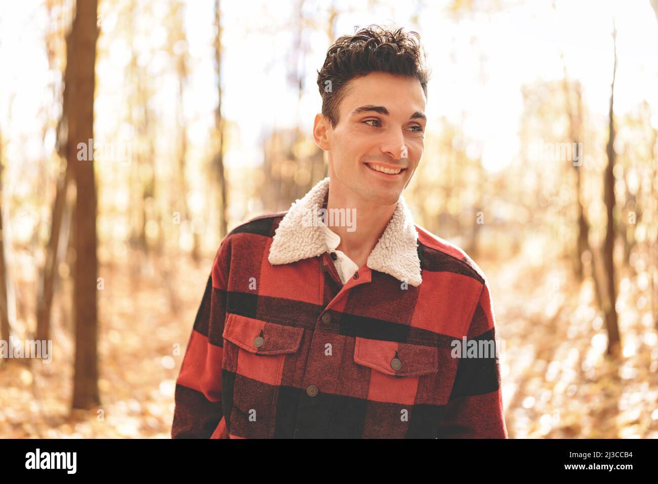 man standing sunset enjoying the falling leaf Stock Photo - Alamy