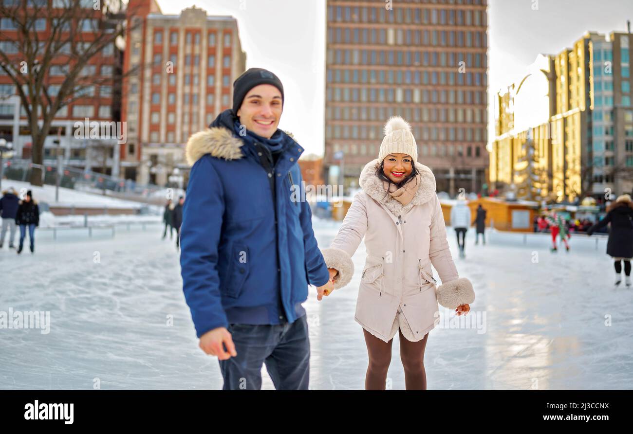 Couple ice skating hi-res stock photography and images - Alamy