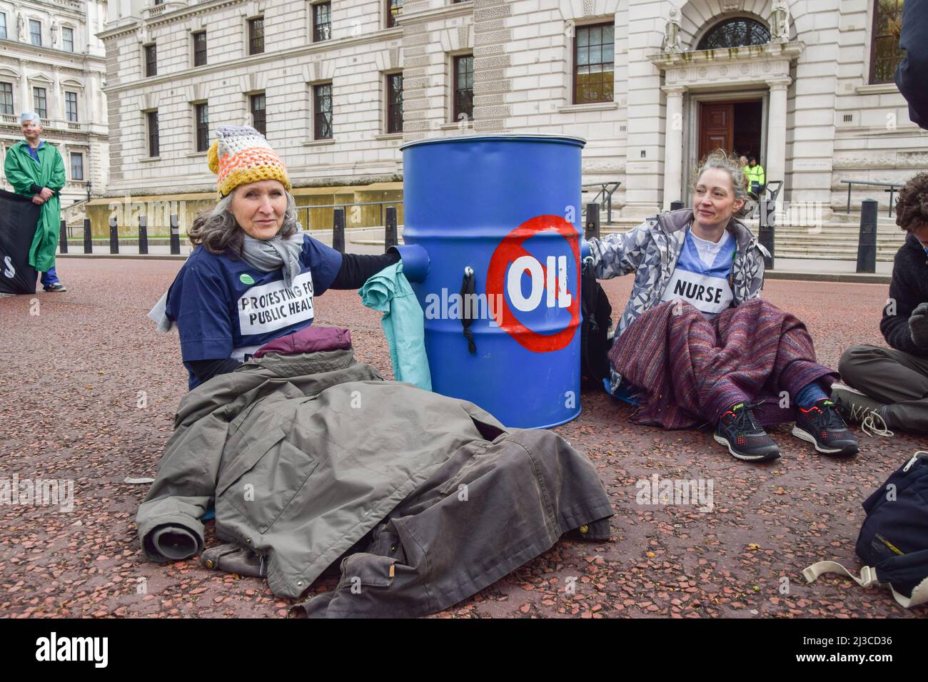 London, England, UK. 7th Apr, 2022. Protesters stuck to a barrel ...