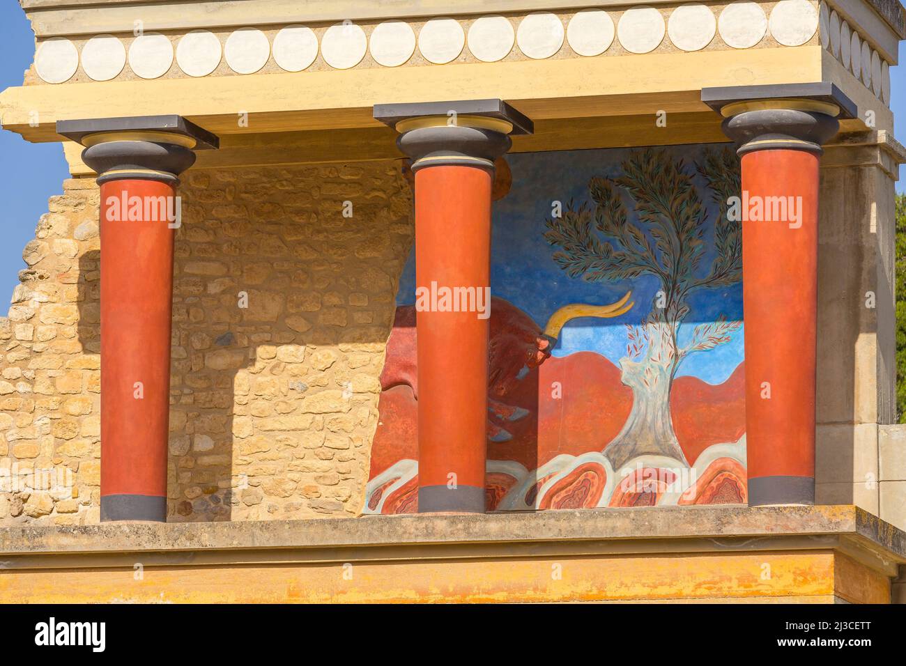 Close-up red columns, North Entrance of ancient Minoan Palace in ...