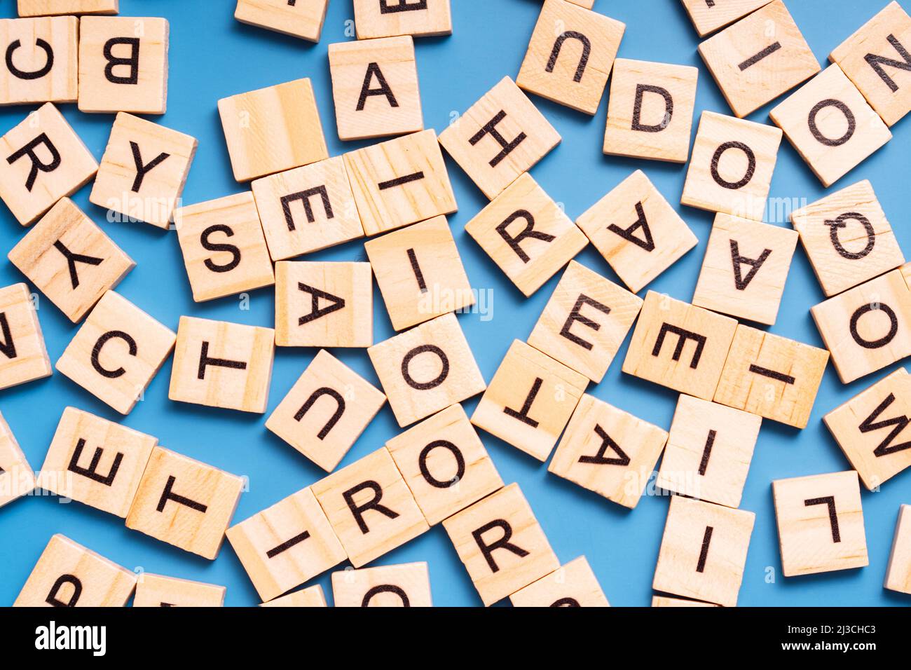 Background from wooden squares of Latin letters Stock Photo - Alamy