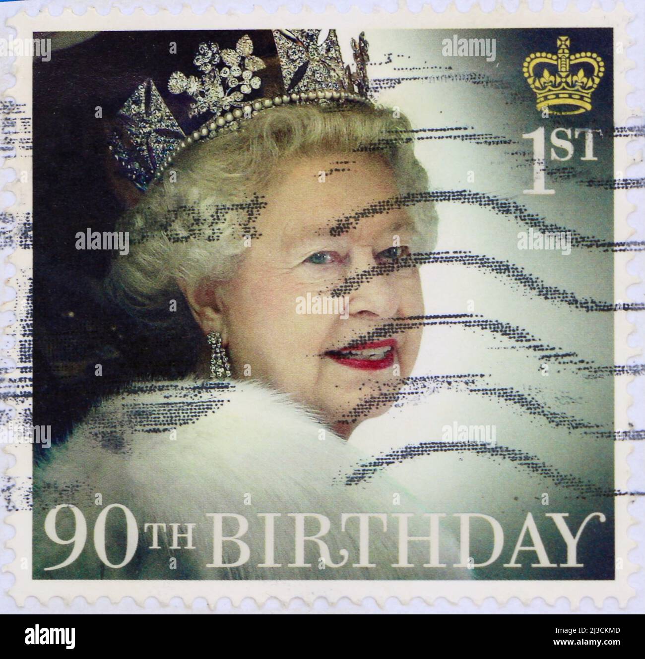 Photo of a used 1st class British postage stamp with a photo of Queen ...