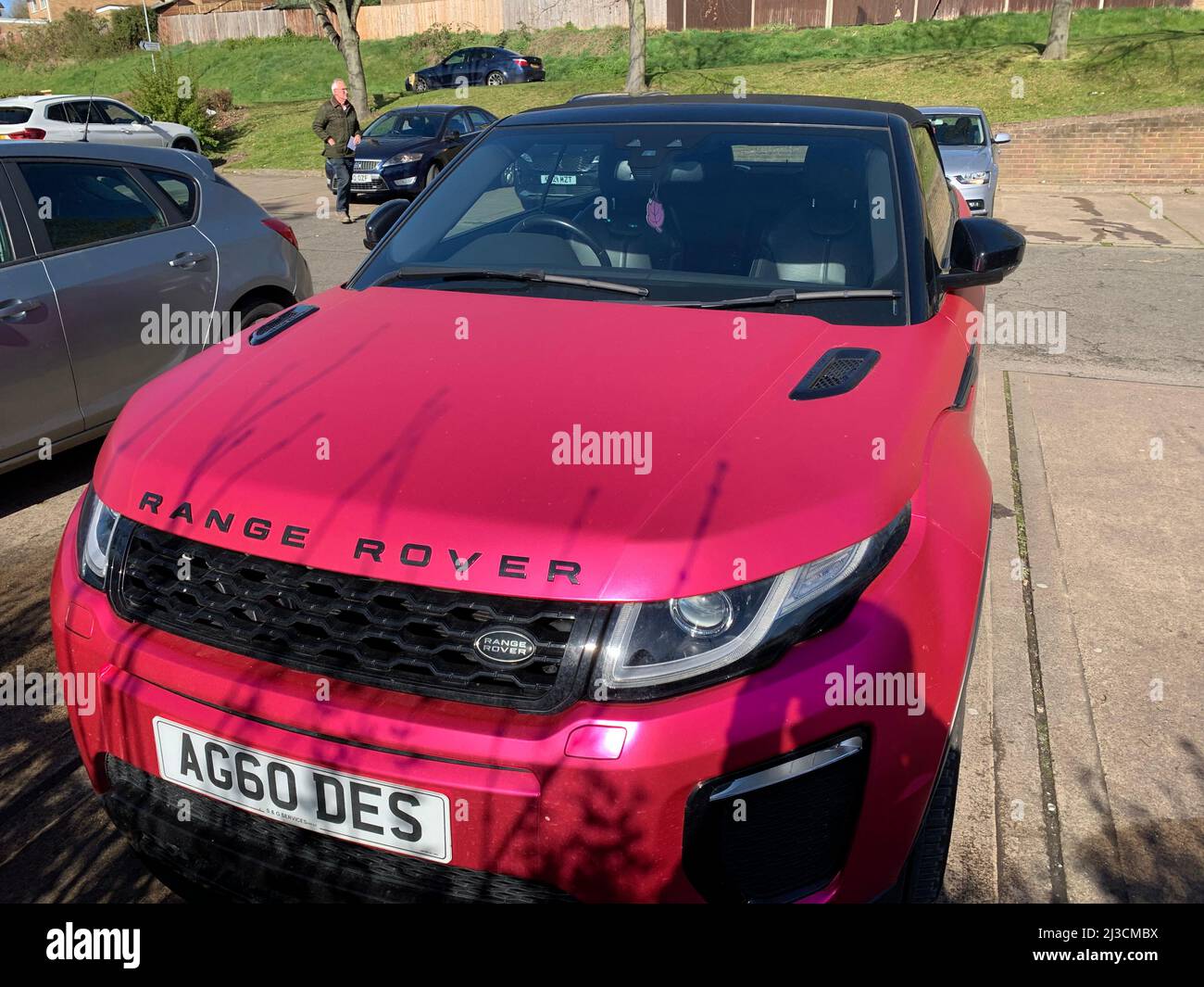 British Range Rover car in pink with black roof sporty looking style ...