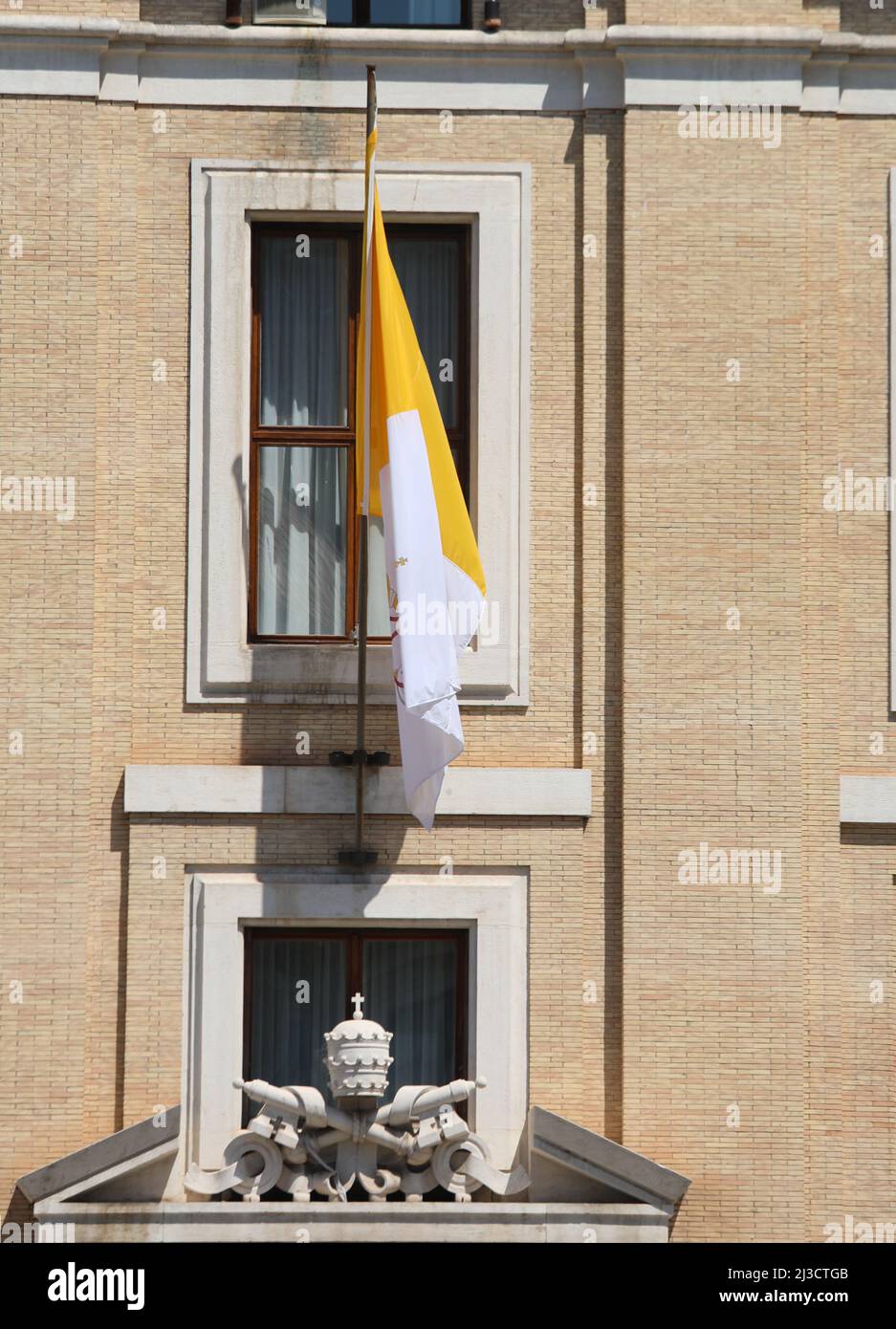 Vatican City, VA, Vatican - August 16, 2020: big National flag and the ...