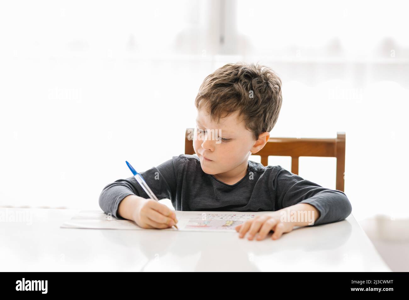 Focused learner hi-res stock photography and images - Alamy