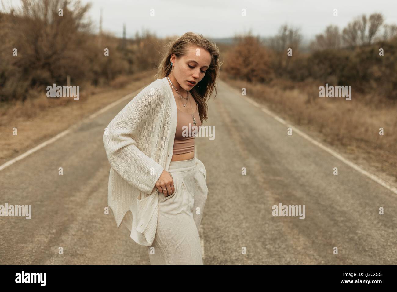 Full body of young female doing Locust pose while practicing yoga in ...
