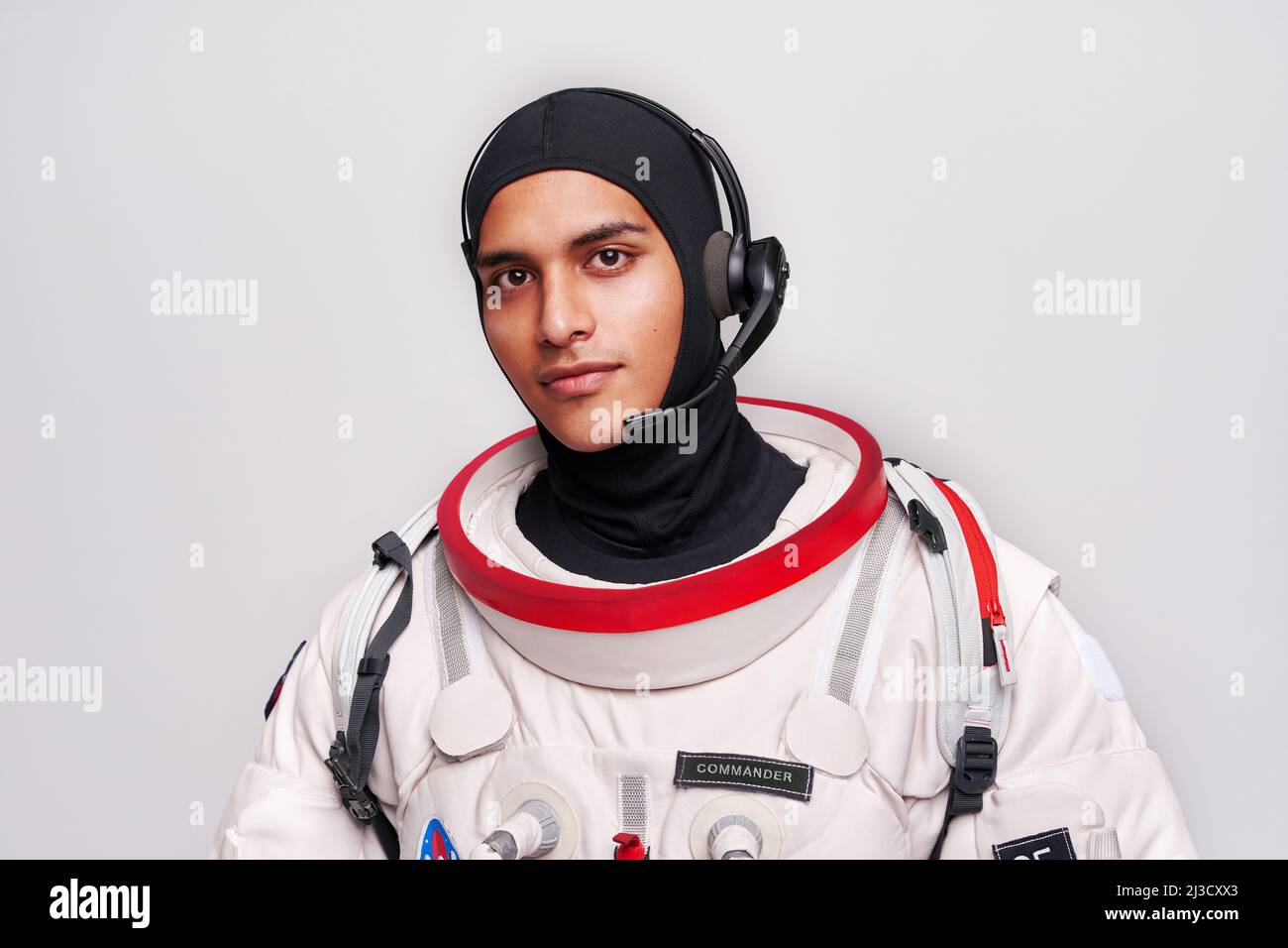Young Colombian cosmonaut dressed in spacesuit and headset ready for ... Young Colombian cosmonaut dressed in spacesuit and headset ready for ...