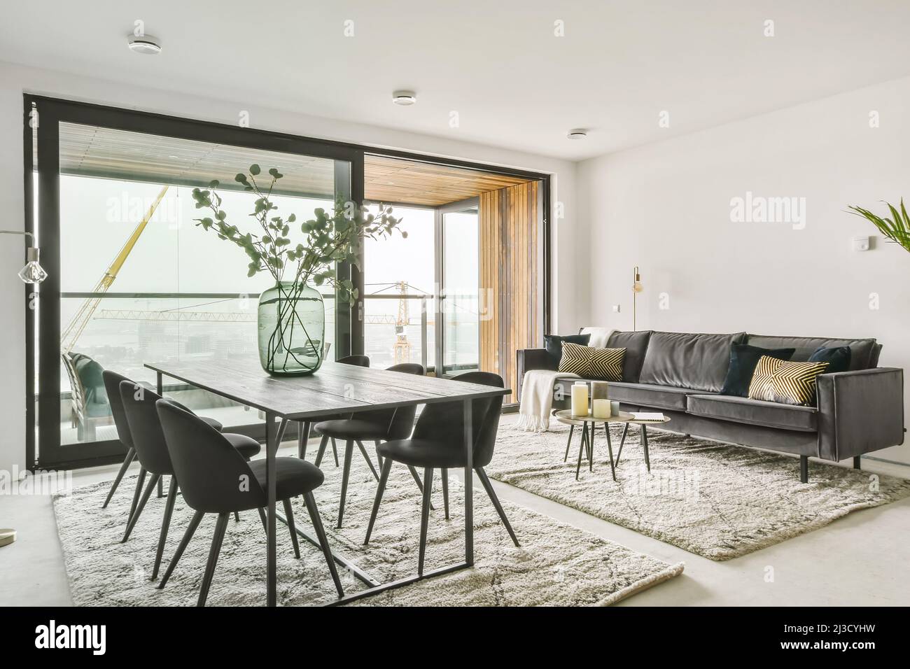 Interior of contemporary lounge room with comfortable sofa and wooden ...