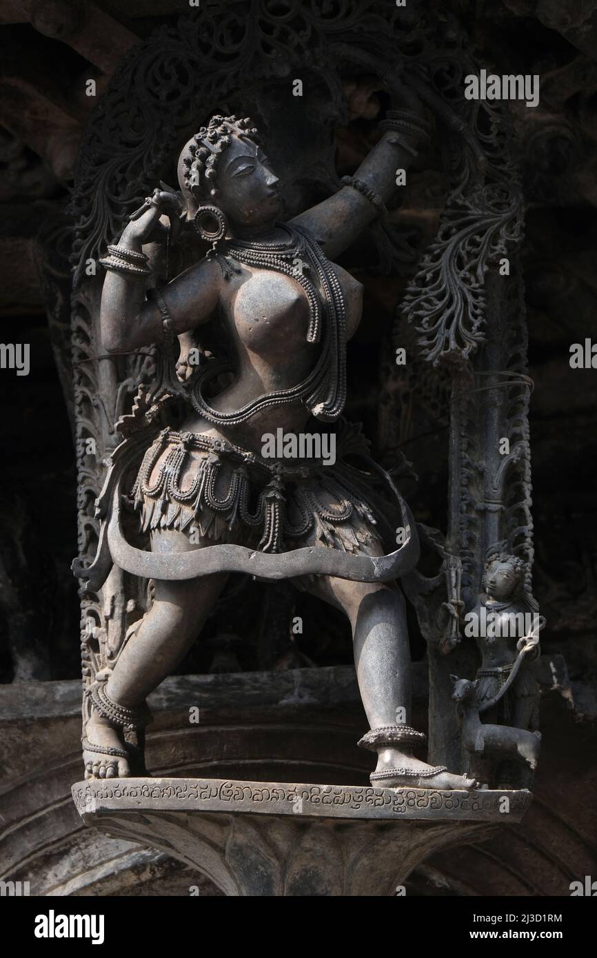 Stone Sculpture of Beautiful Female (Madanikas) with selective focus ...