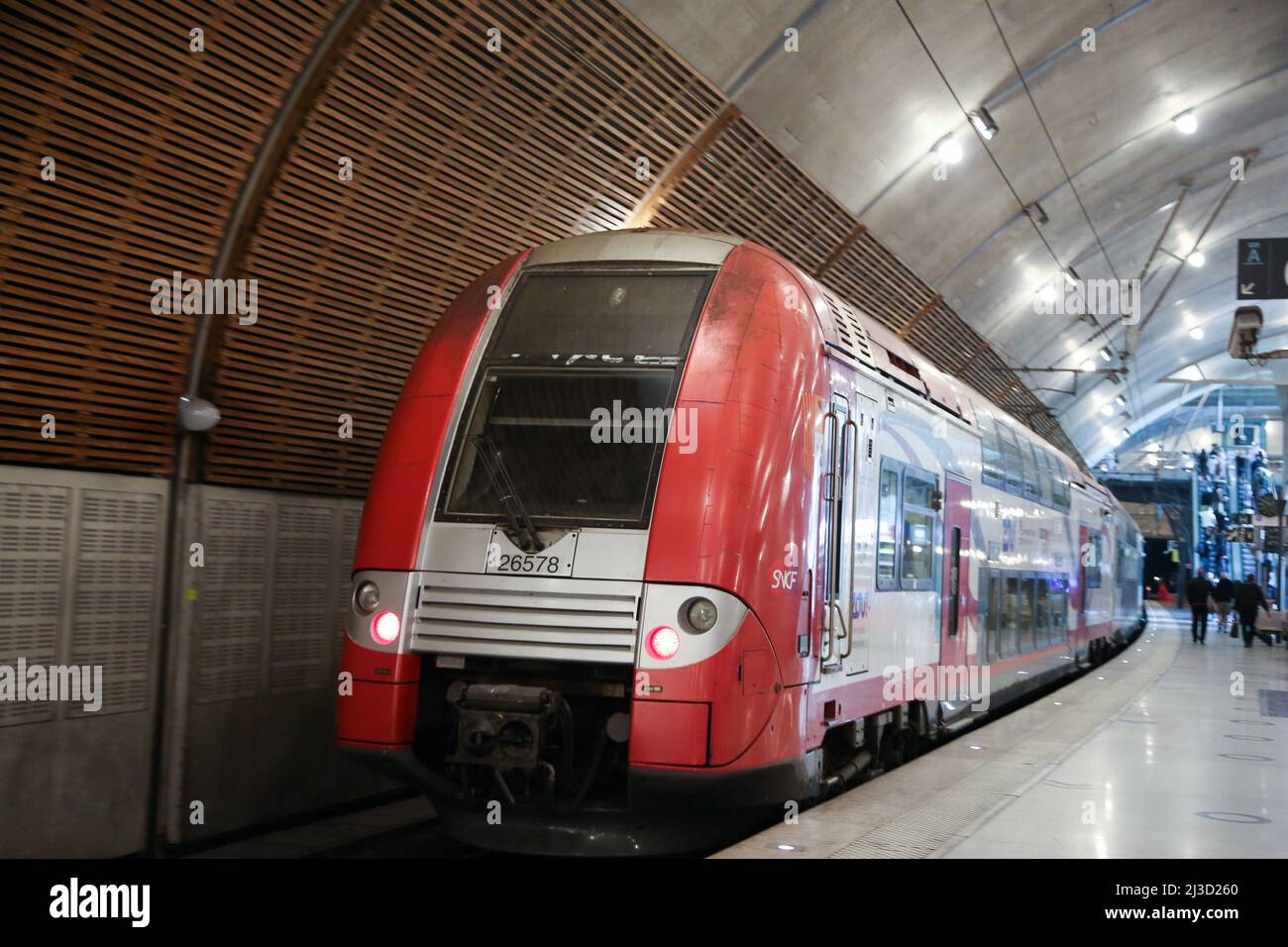 A SNCF TER double decker train leaves Monte-Carlo station. A train ride ...