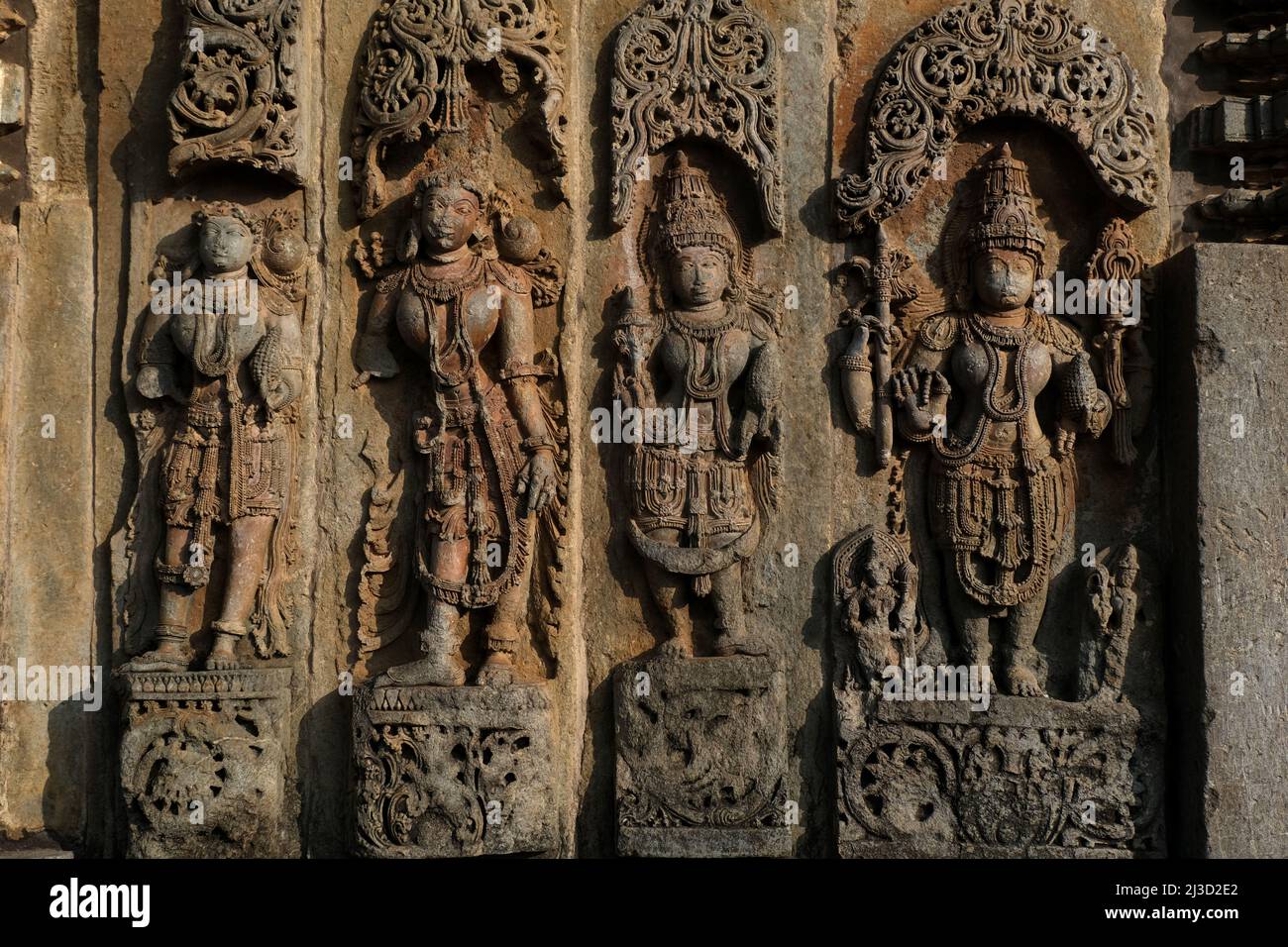Stone Sculpture of Hindu Gods with selective focus, 12th century Hindu ...