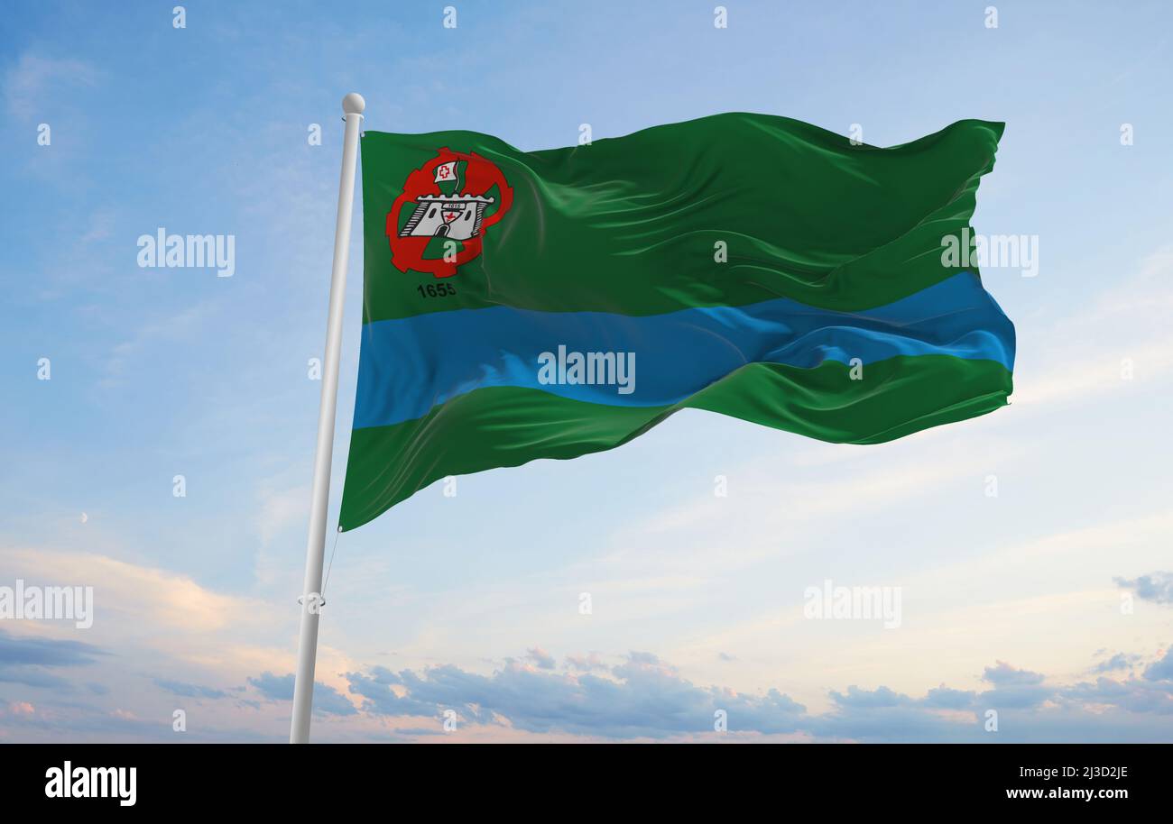 flag of Jundiai , Brazil at cloudy sky background on sunset, panoramic ...