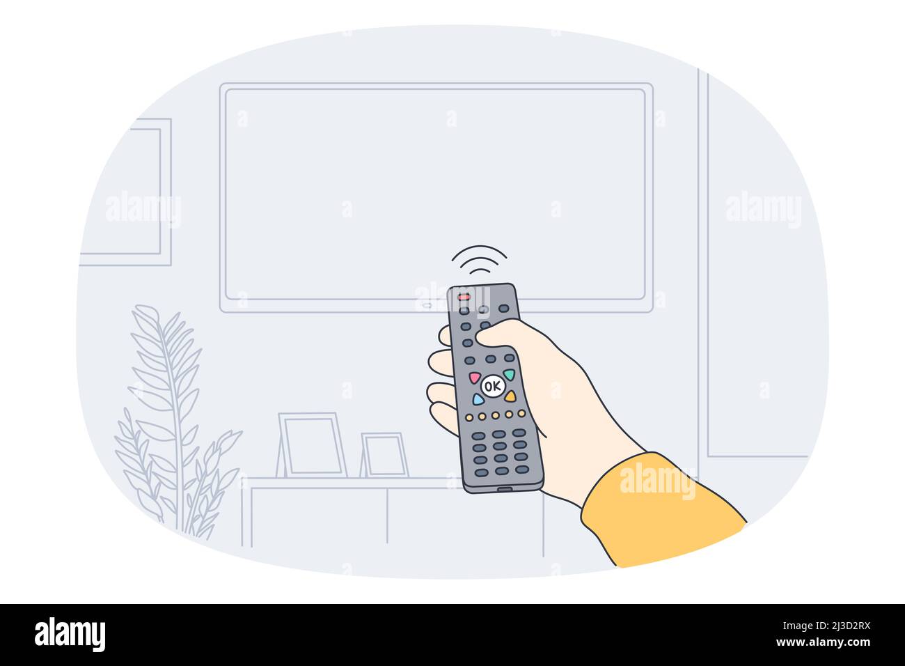 Remote control and entertainment concept. Human hand holding remote ...