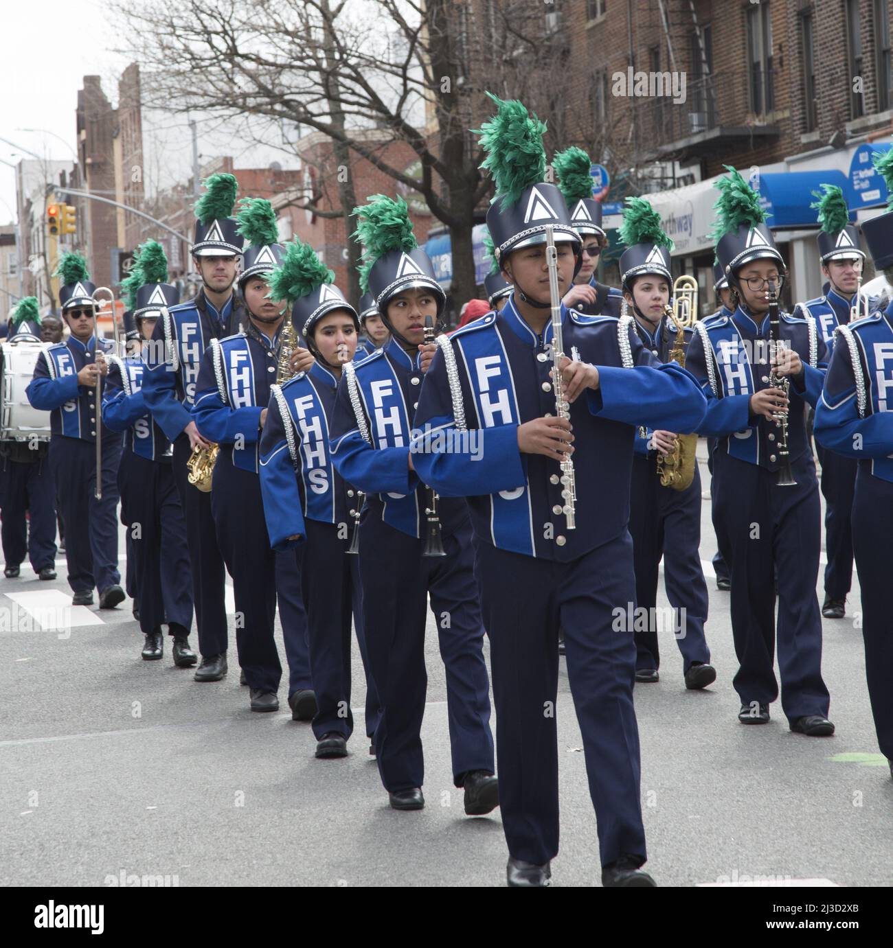 Members of the Fort Hamilton High School Marching Band proudly perform ...