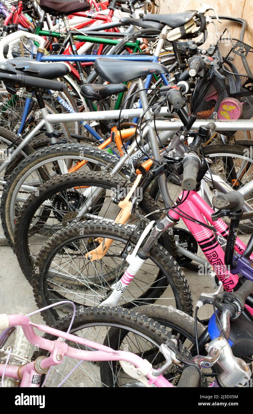 Piles of bikes waiting to be recycled Stock Photo - Alamy