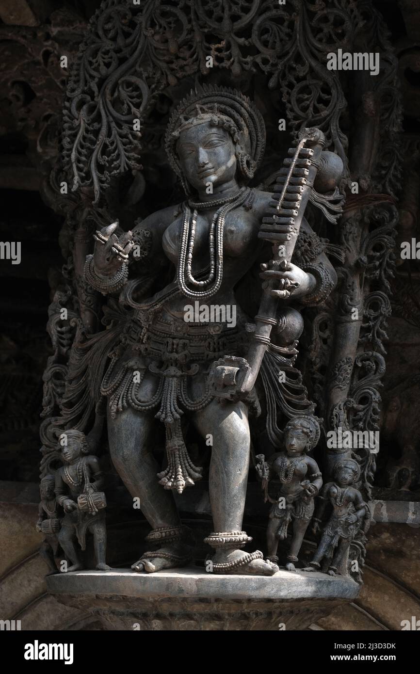 Stone Sculpture of Beautiful Female (Madanikas) with selective focus ...