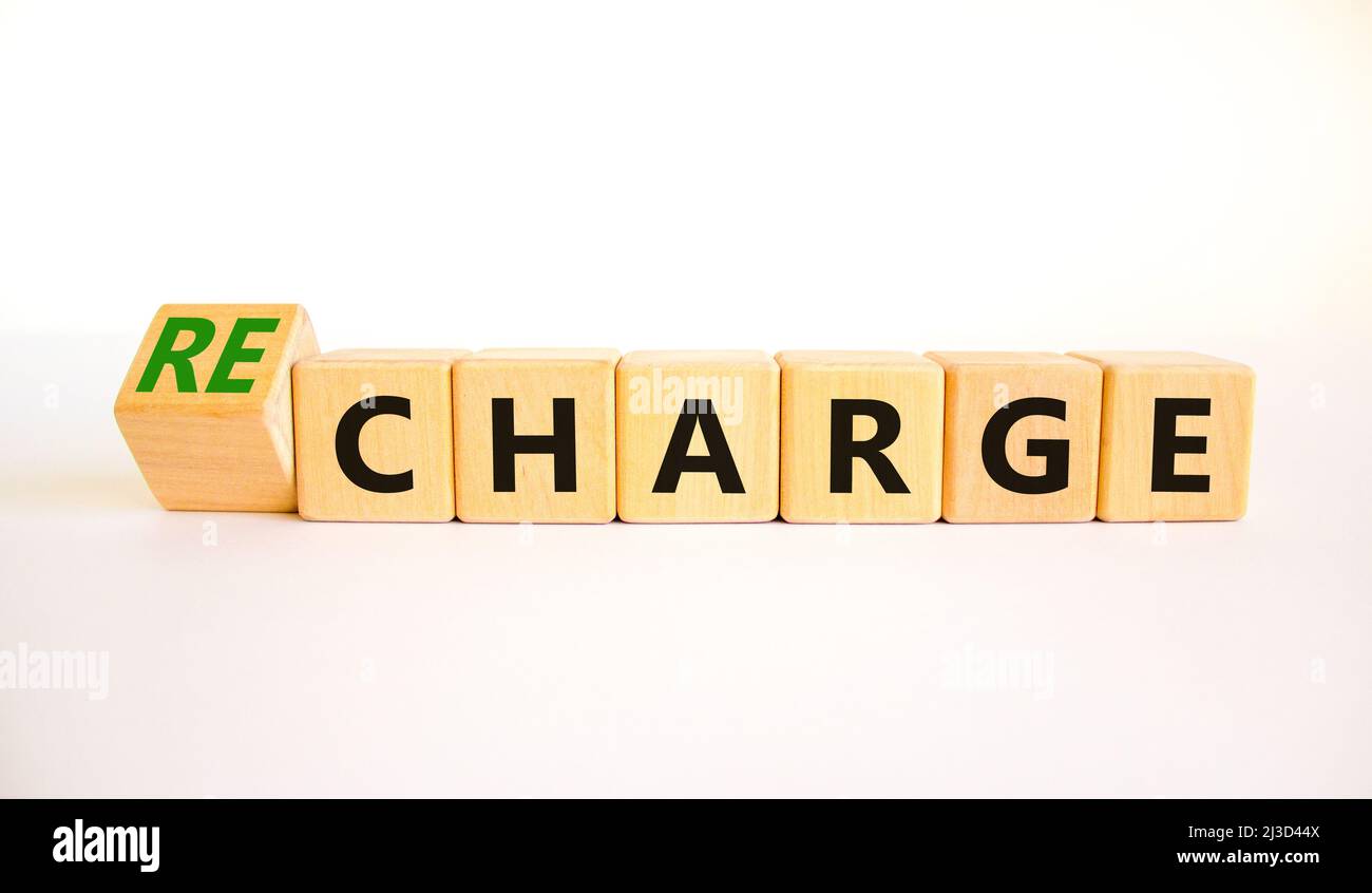 Charge or recharge symbol. Turned wooden cubes and changed the word ...