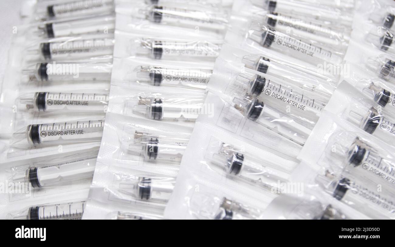 Medical waste, therapeutic syringes in packaging A bunch of unused ...