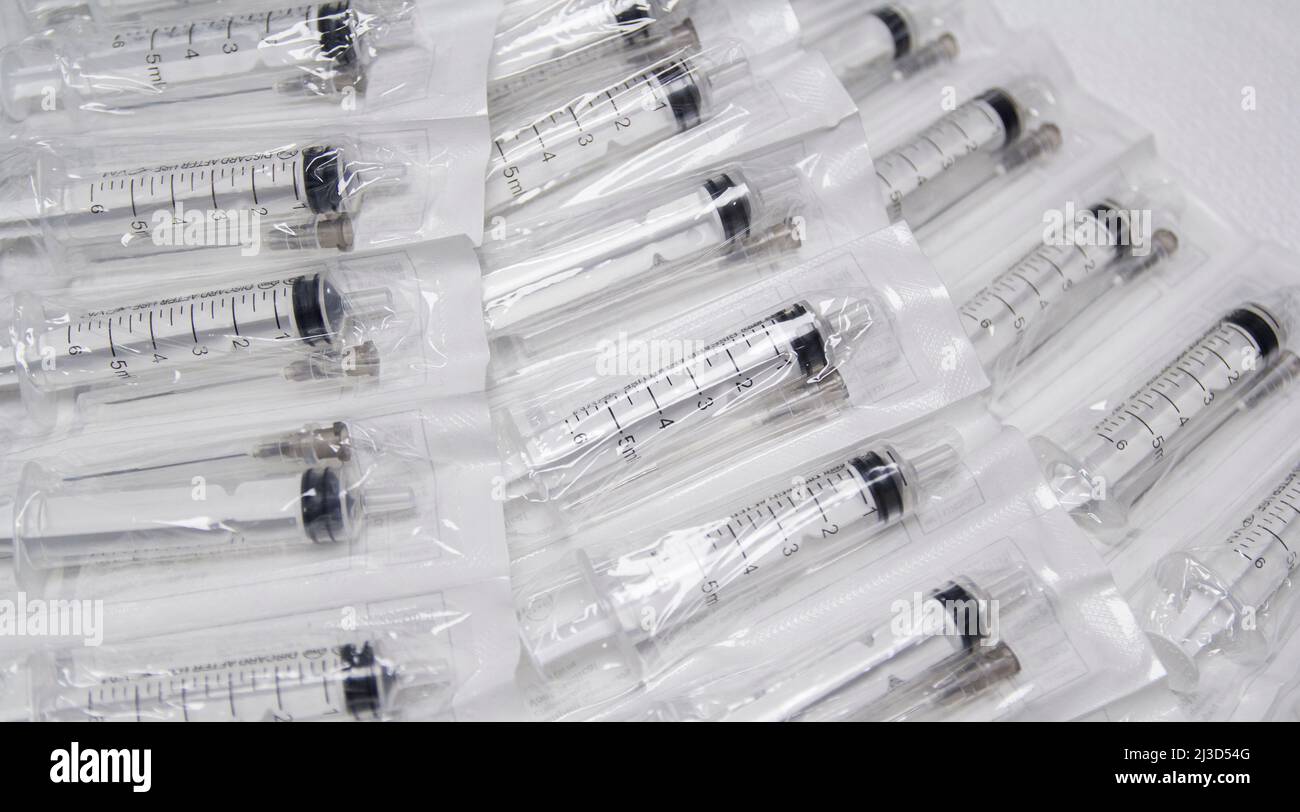 Medical waste, therapeutic syringes in packaging A bunch of unused ...