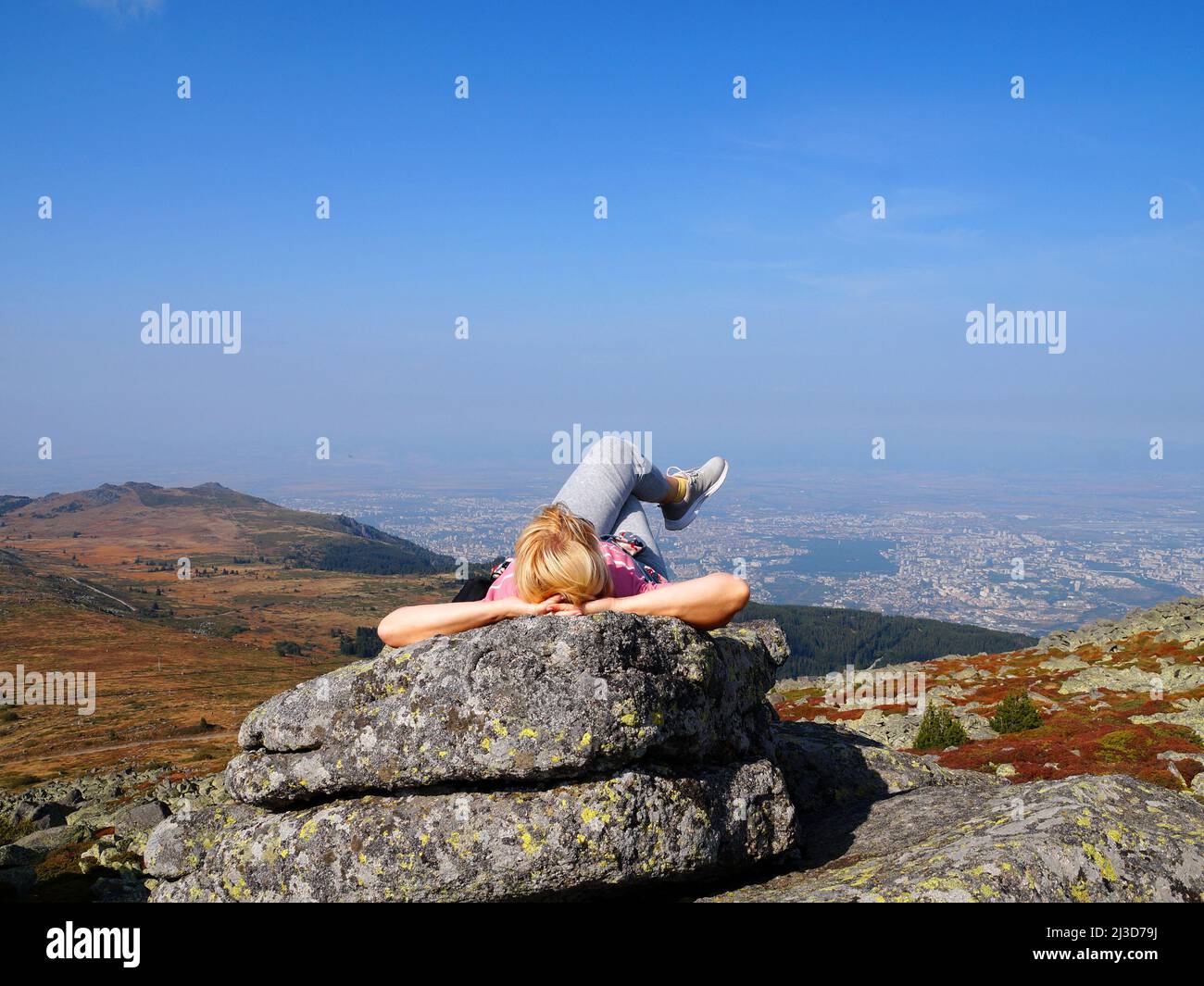 Woman lying back legs up hi-res stock photography and images - Alamy