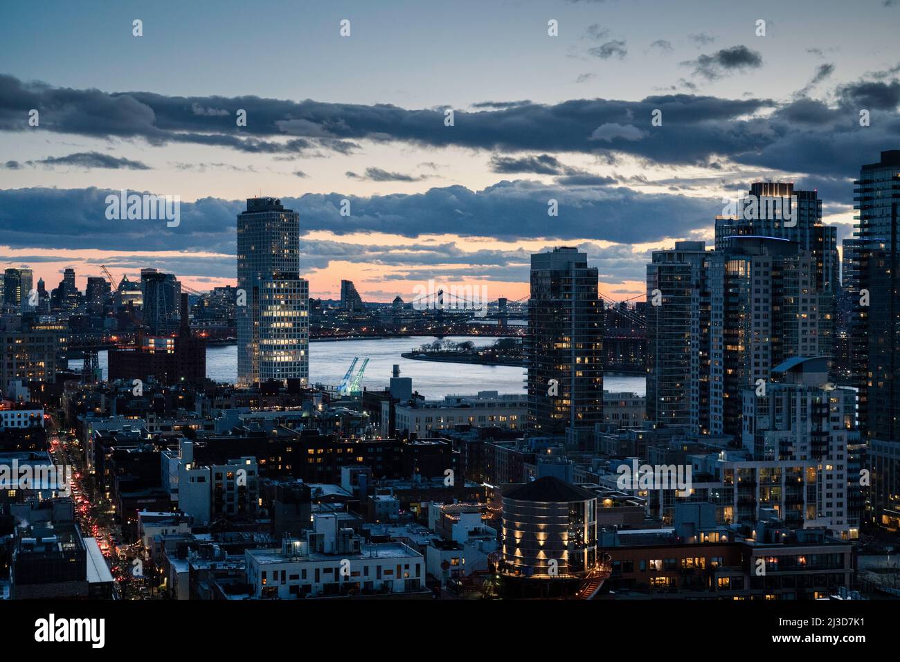 View of the lower Manhattan/Brooklyn skyline as the sun sets, taken ...