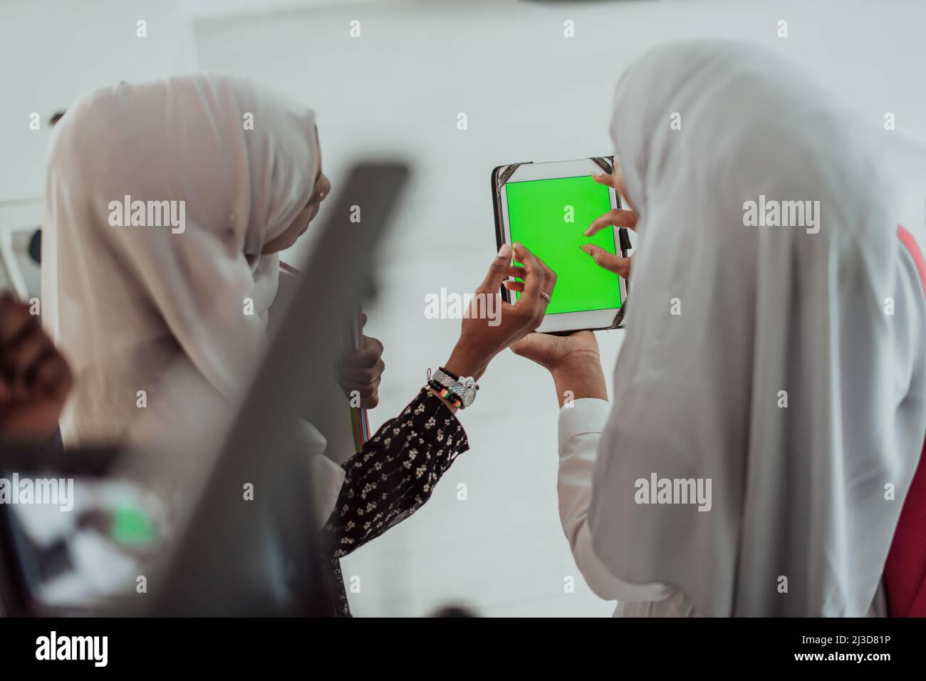 Group of happy african students having conversation and team meeting ...