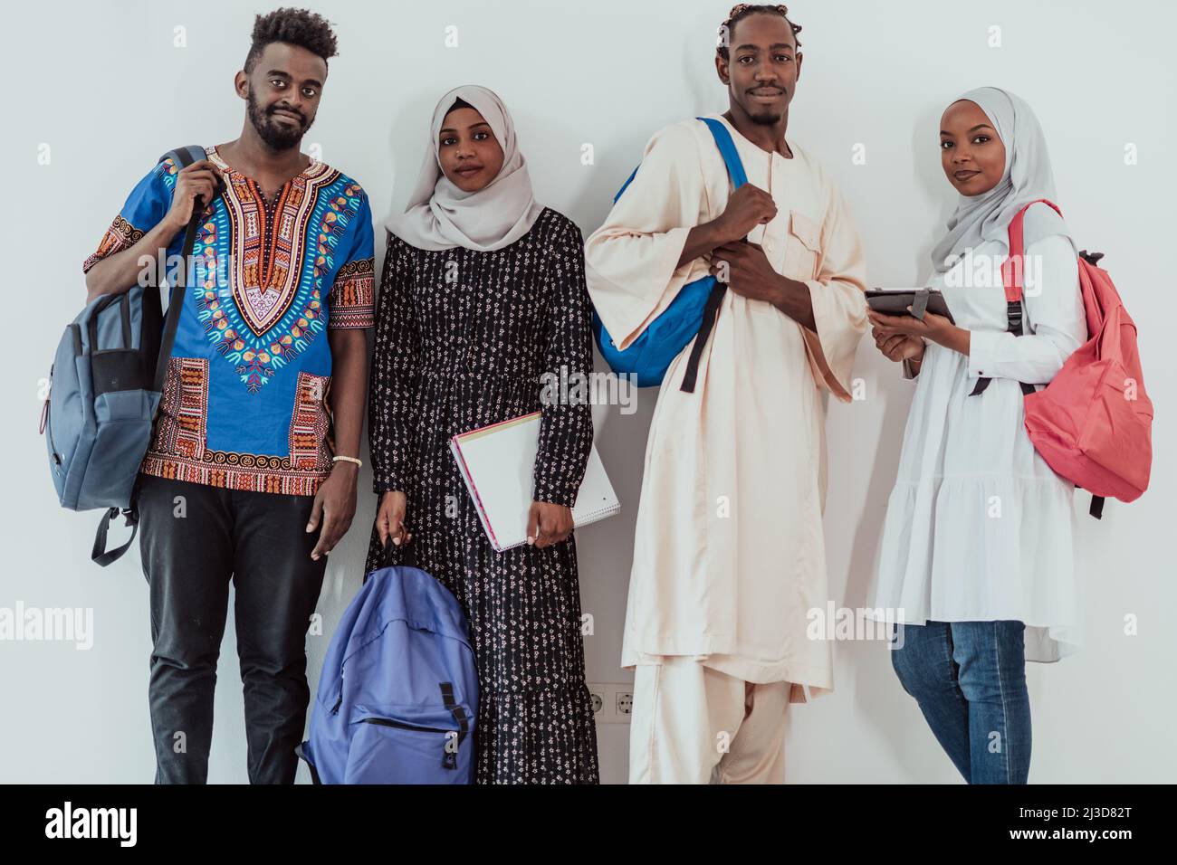 Photo of a group of happy african students talking and meeting together ...