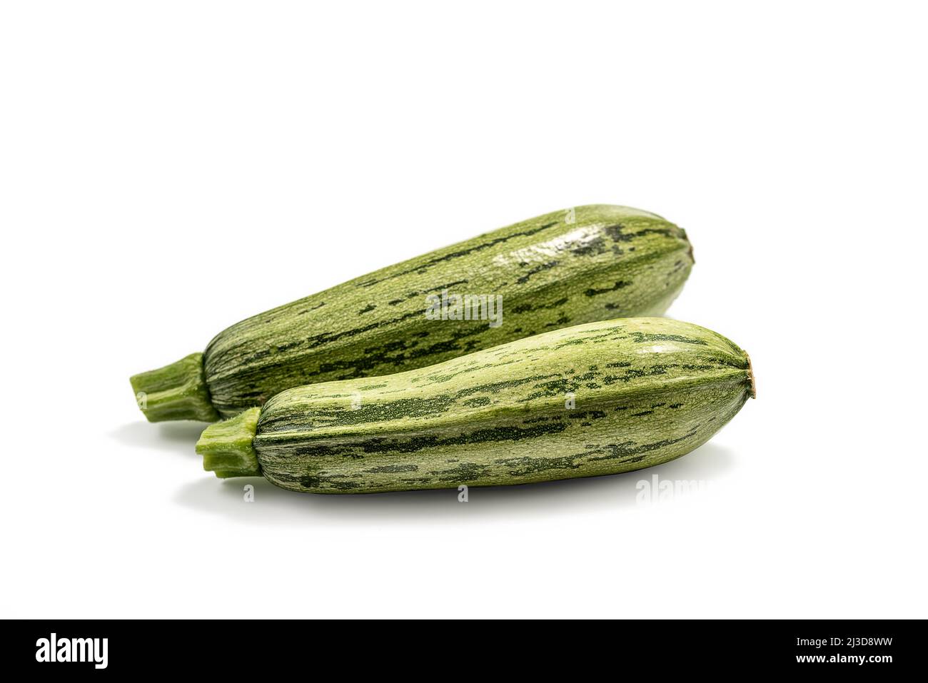 Fresh cut zucchini isolated on a white background with clipping path ...