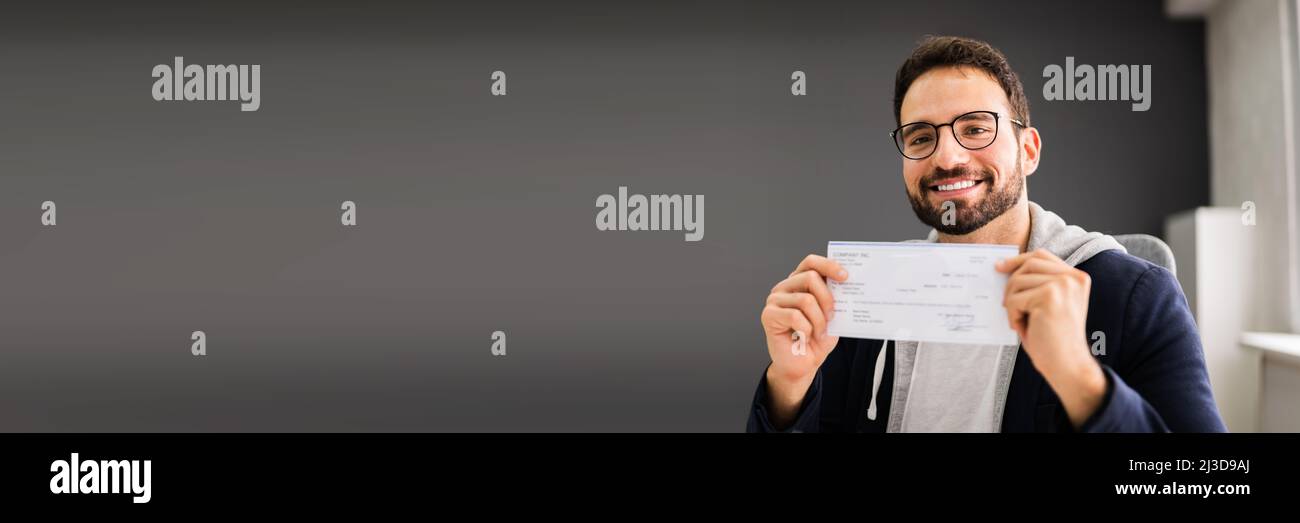 Man holding cheque hi-res stock photography and images - Alamy