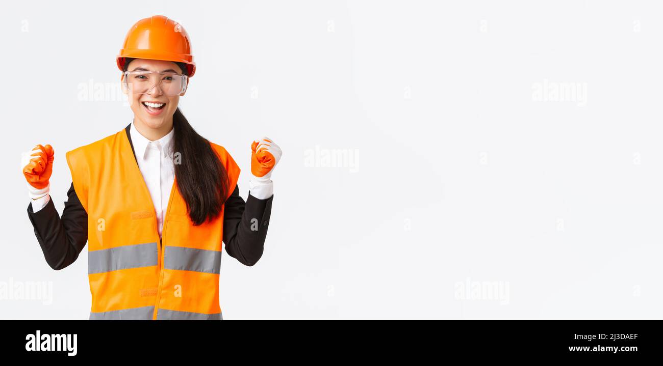 Successful winning female asian engineer, construction architect in ...