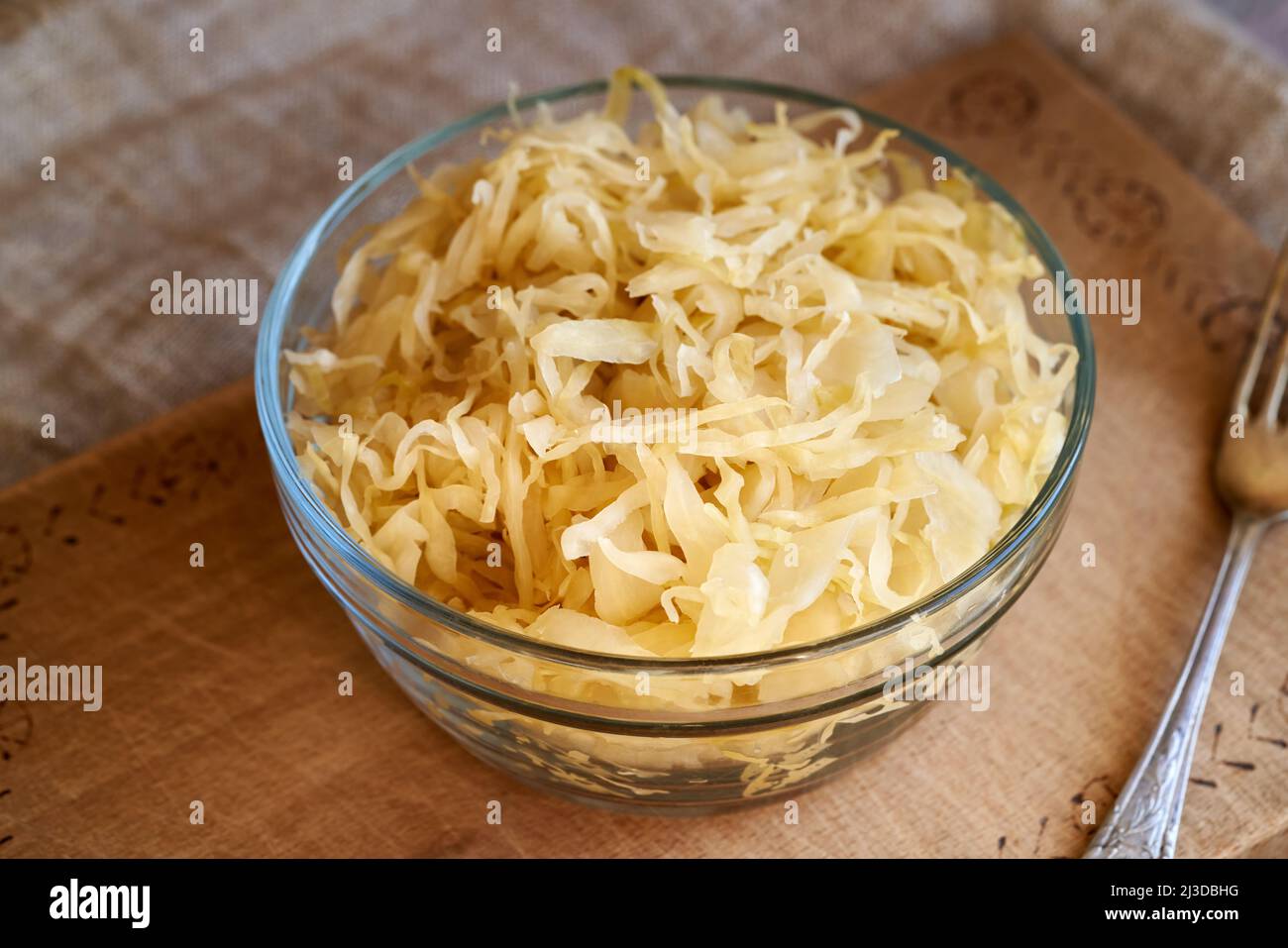Homemade fermented cabbage in a glass bowl - source of probiotics Stock ...