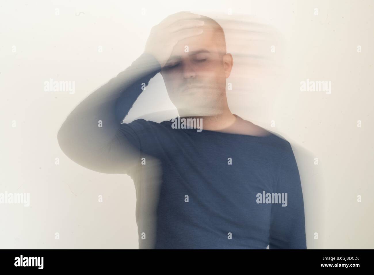 Close up photo of man with vertigo ilness. Motion blur effect ...