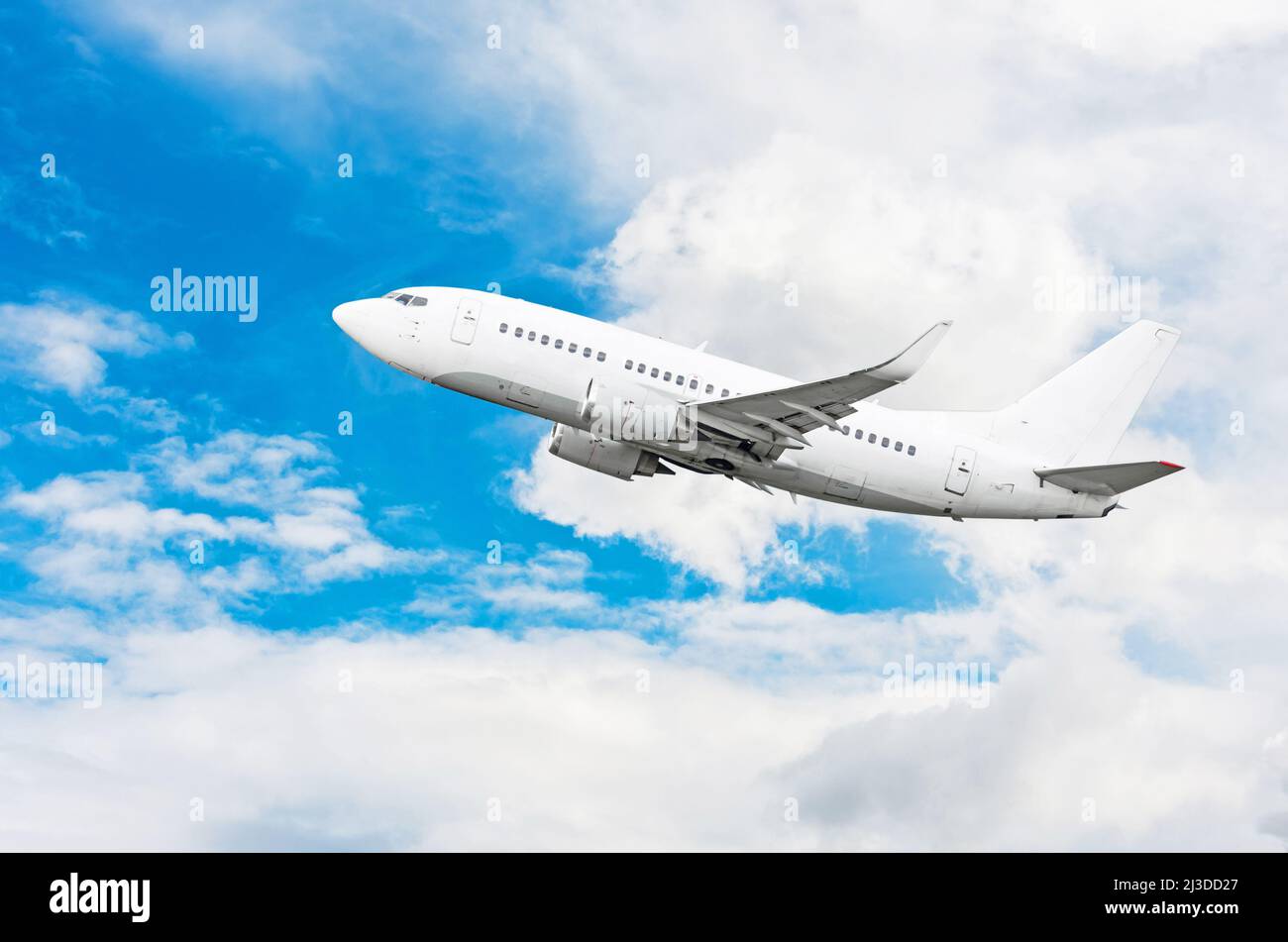 Passenger airplane flying travel, trip at flight level over the white ...