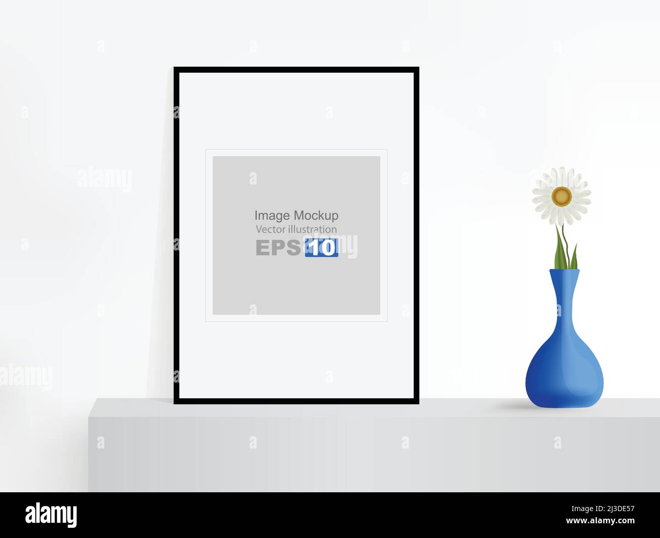 Image frame mockup isolated on cubical cabinet stand with blue flower ...