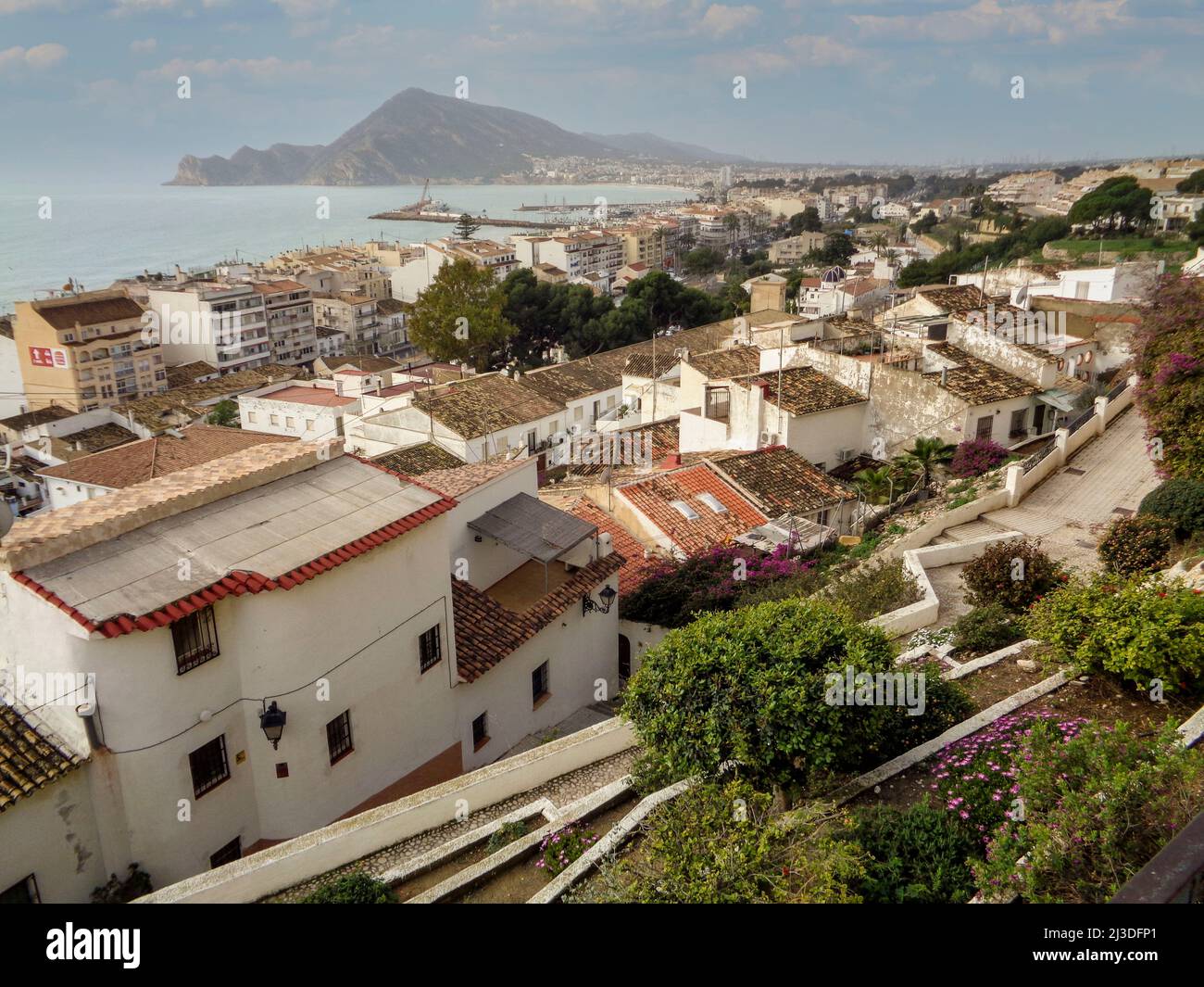 Architectural detail of mainly white dwellings and colourful lamps in ...